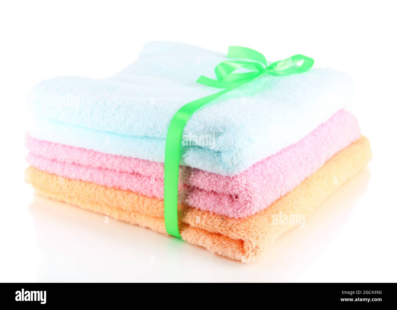 Towels tied with ribbon isolated on white Stock Photo - Alamy