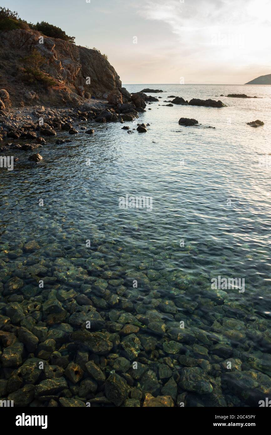 sunset on anavyssos beach in athens greece Stock Photo - Alamy