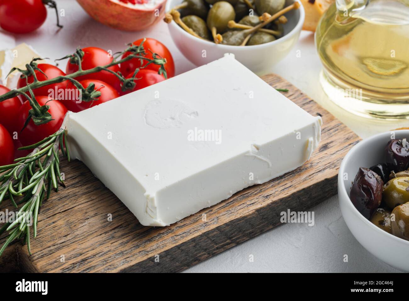Traditional greek feta cheese set, on white background Stock Photo - Alamy