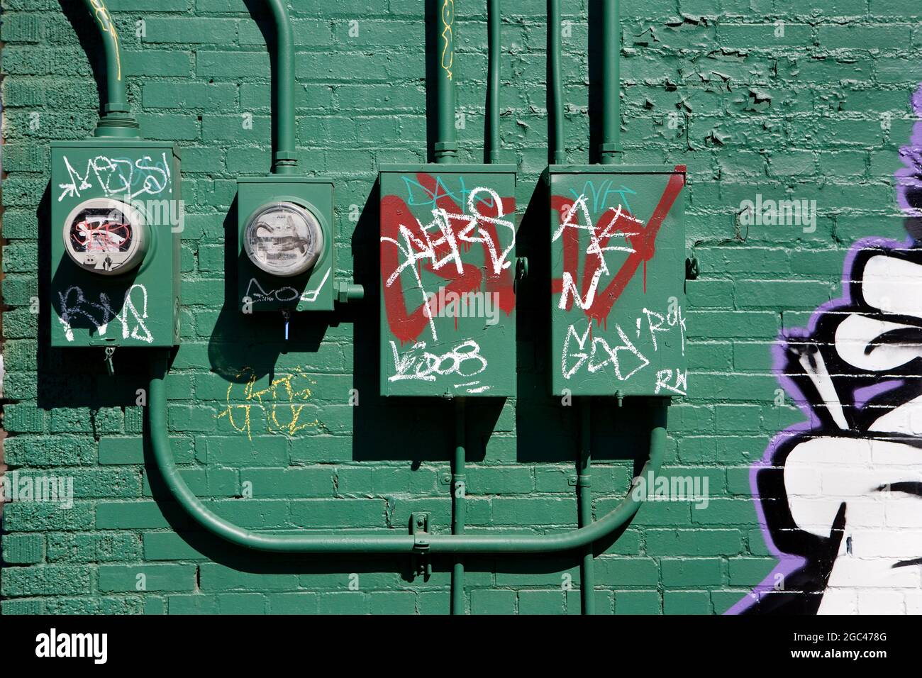 Denver green wall grafitti Stock Photo - Alamy