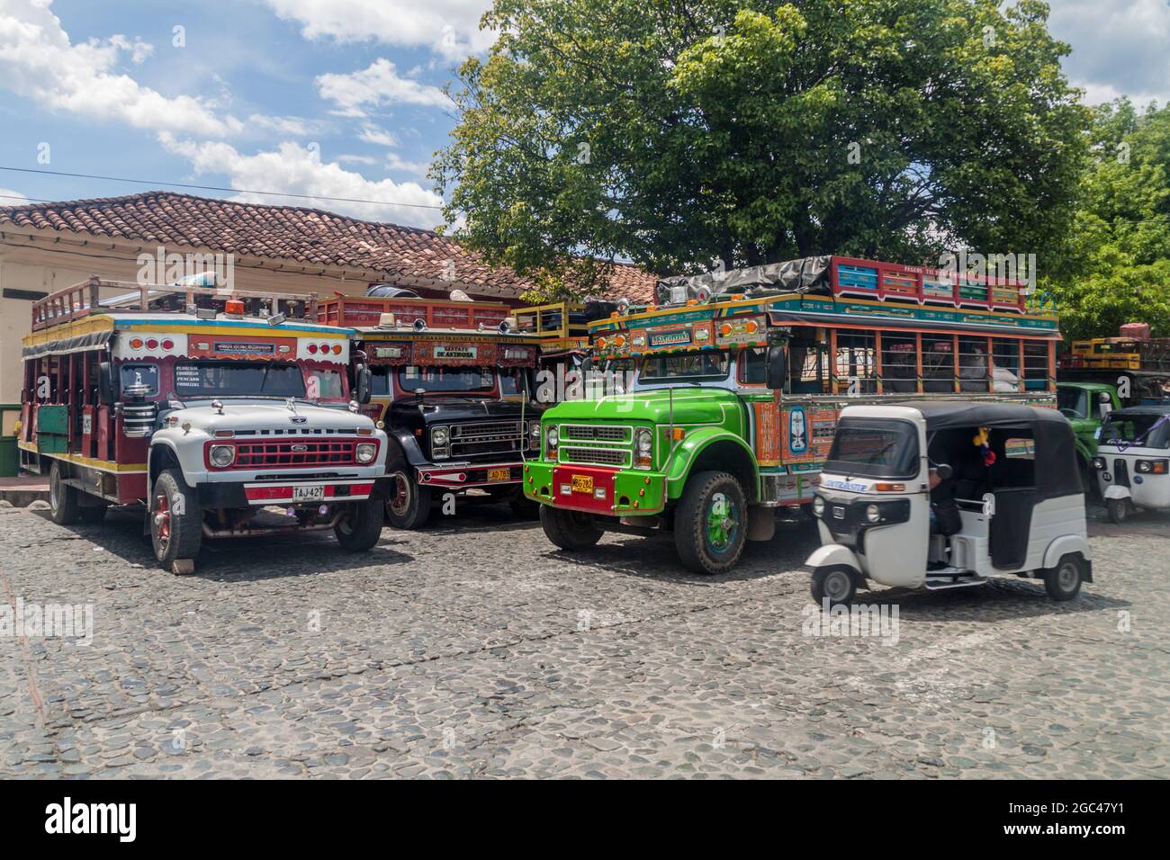 SANTA FE DE ANTIOQUIA, COLOMBIA - SEPTEMBER 3, 2015: Colorful chiva ...