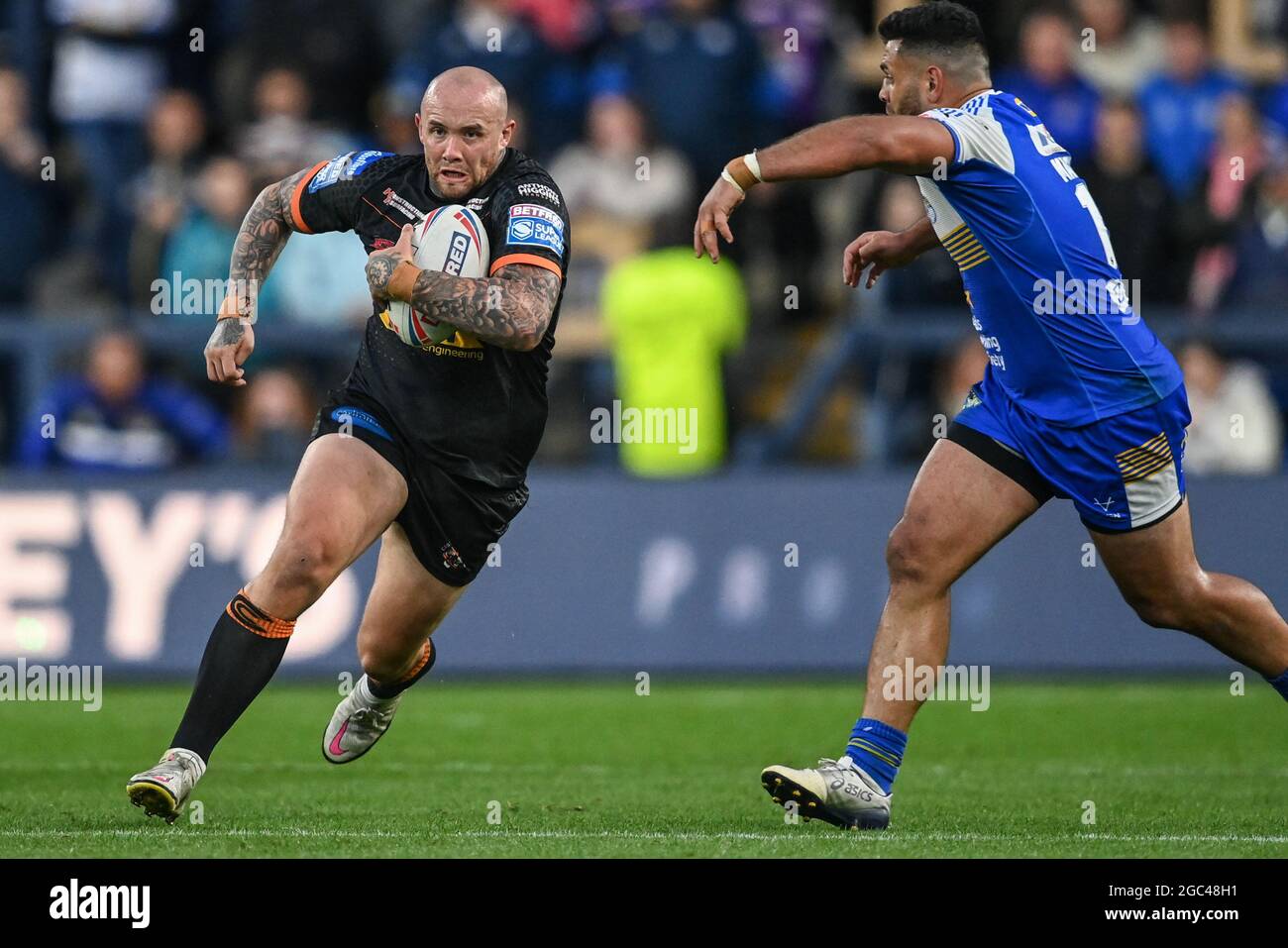 Nathan Massey (14) of Castleford Tigers breaks with the ball Stock ...