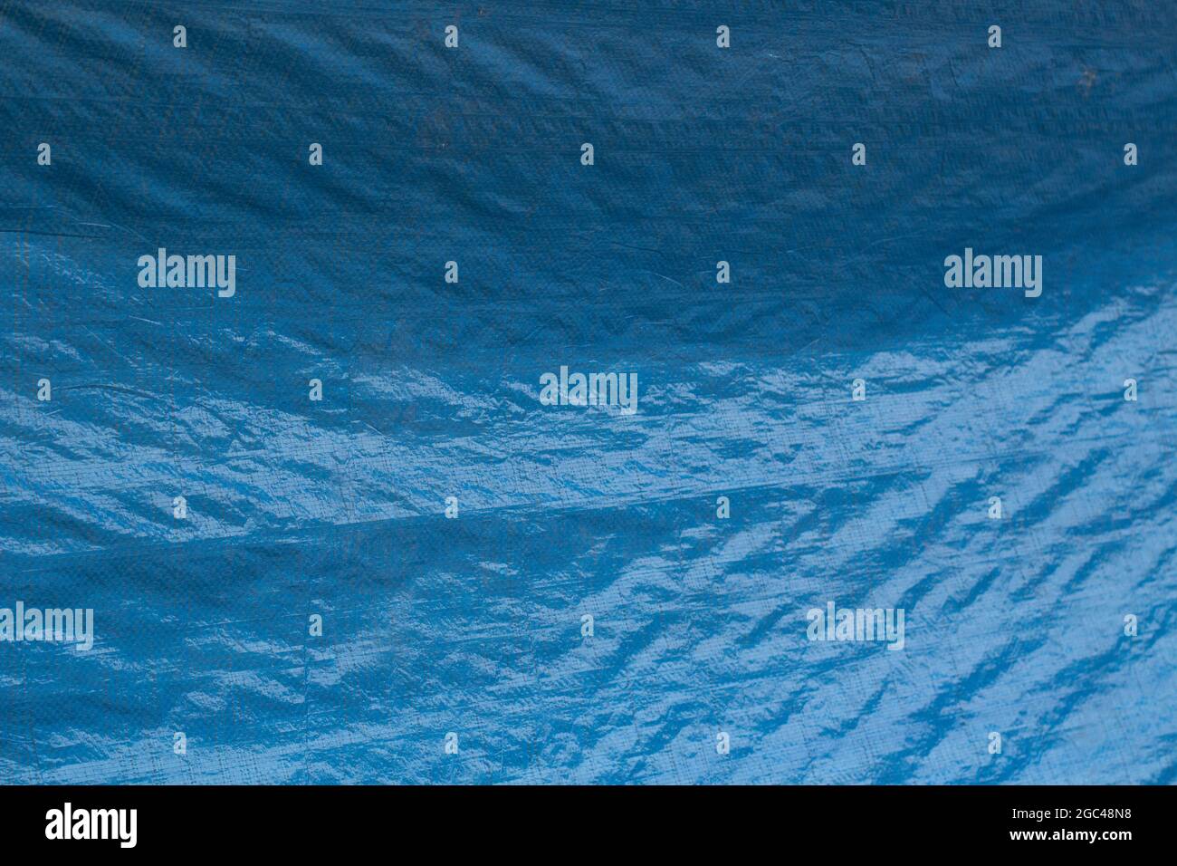 Texture of a blue cloth bag. Blue plastic bag. Fine weave texture ...