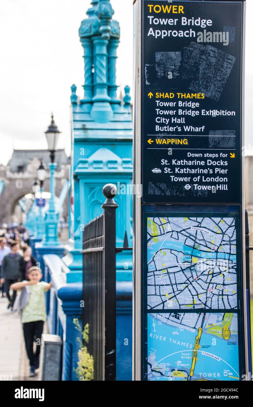 Tower bridge map sign board with tower bridge in background Stock Photo ...