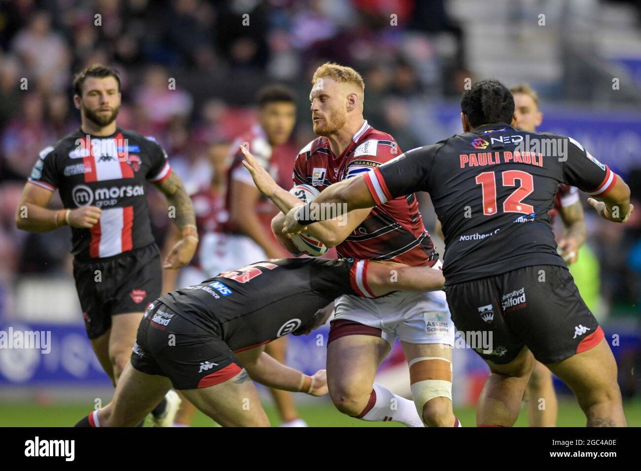 Joe Bullock (10) of Wigan Warriors begins an attacking move Stock Photo ...