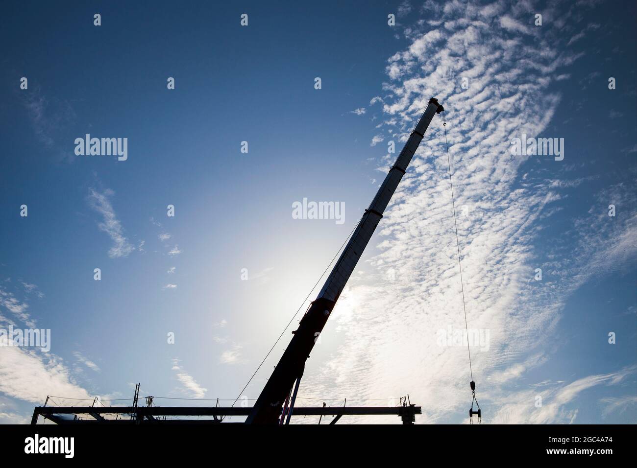 Silhouette of crane and construction site, Tosu, Saga, Japan Stock ...