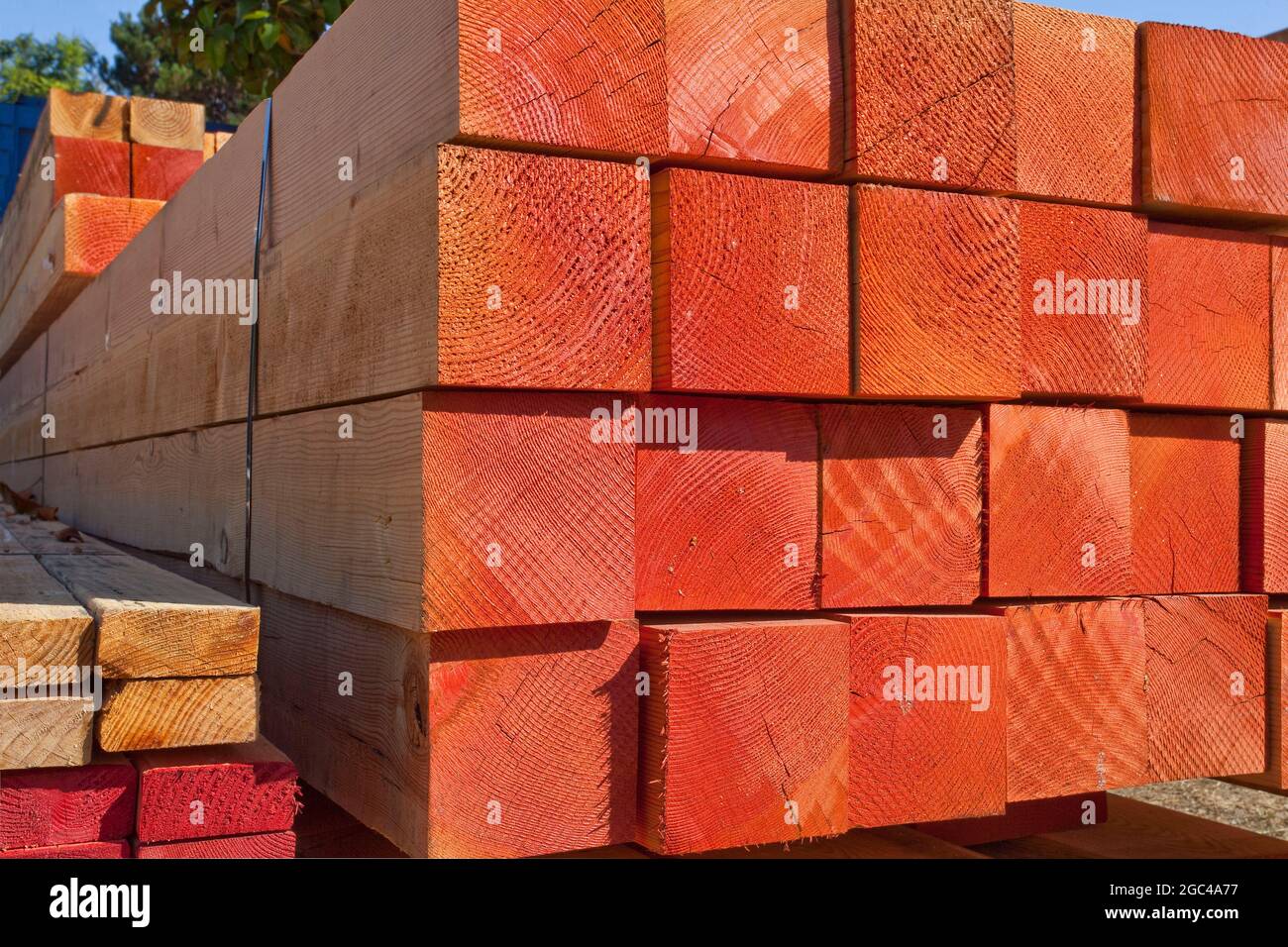 Stacked lumber construction site Stock Photo - Alamy