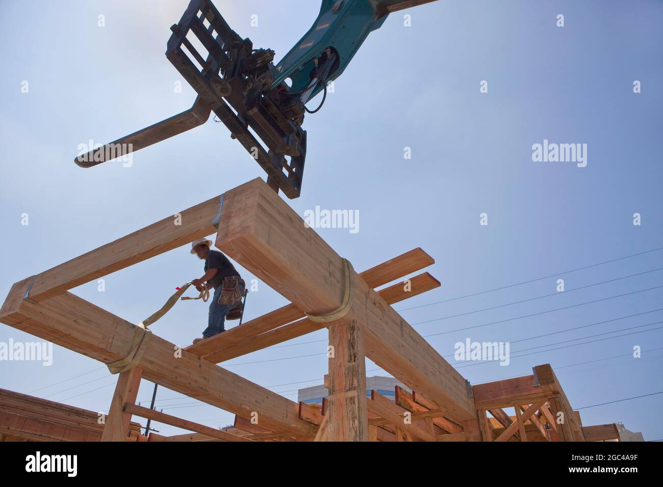 Worker condo construction site Stock Photo - Alamy