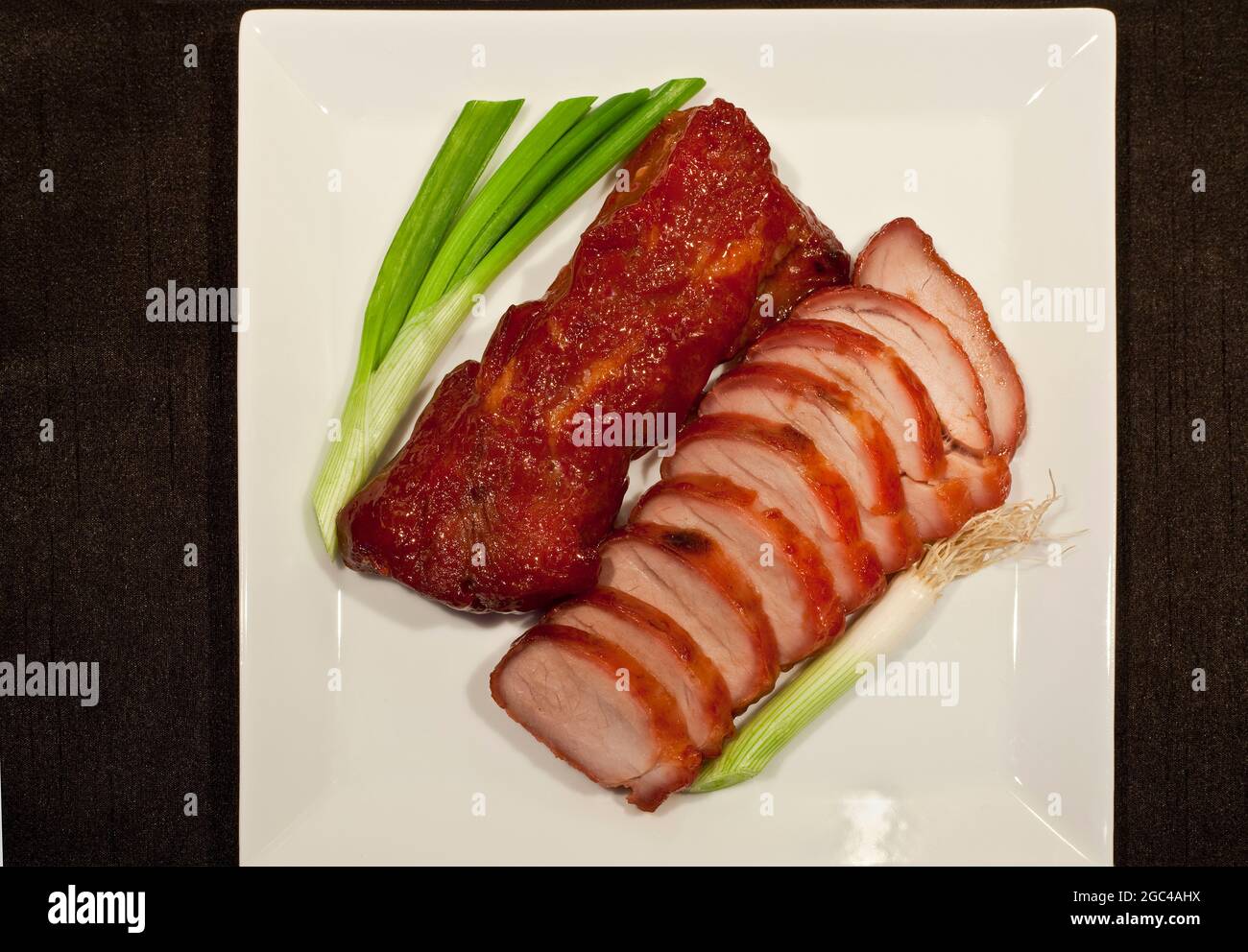 Mouthwatering cha shu pork on a plate Stock Photo - Alamy