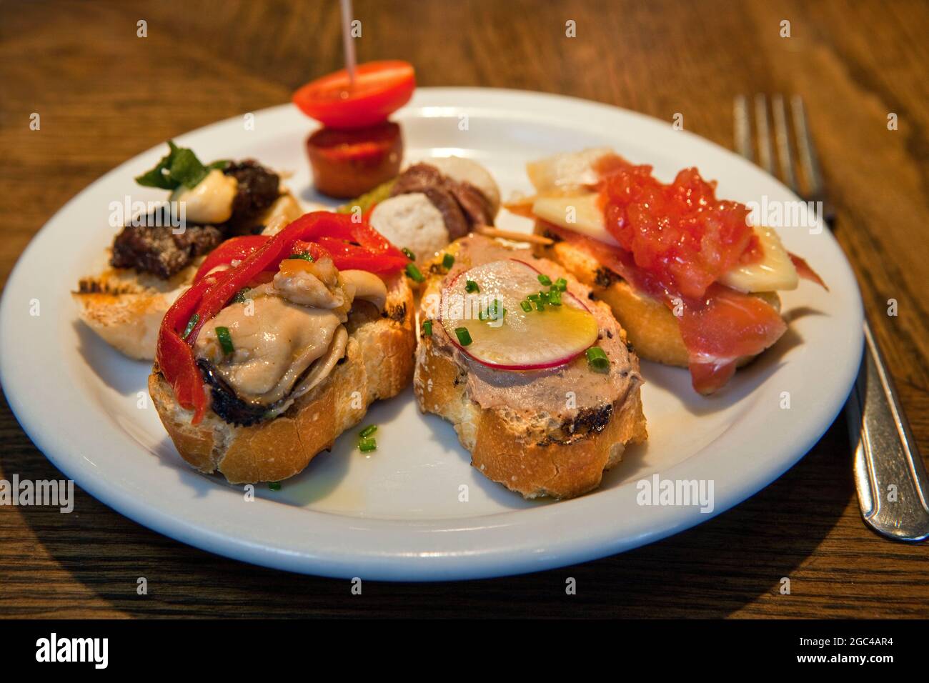 A delicious plate of assorted tapas from a Spanish restaurant in Los ...