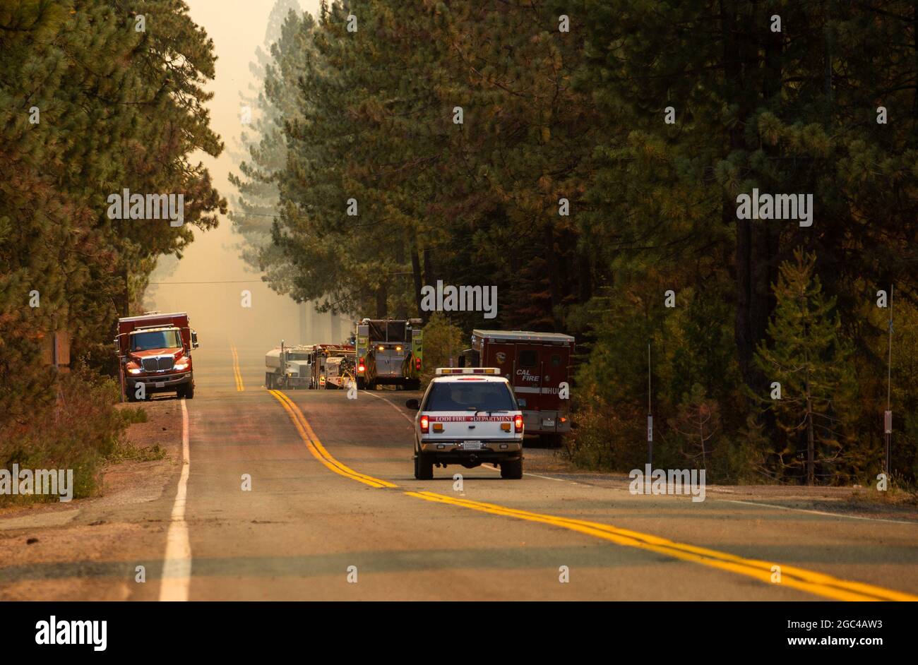 Lassen National Forest, USA. 6th Aug, 2021. Fire trucks are seen at an ...