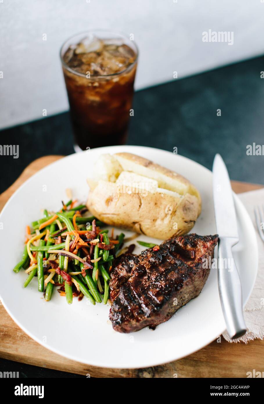 Closeup shot of beef with salad and soda Stock Photo - Alamy