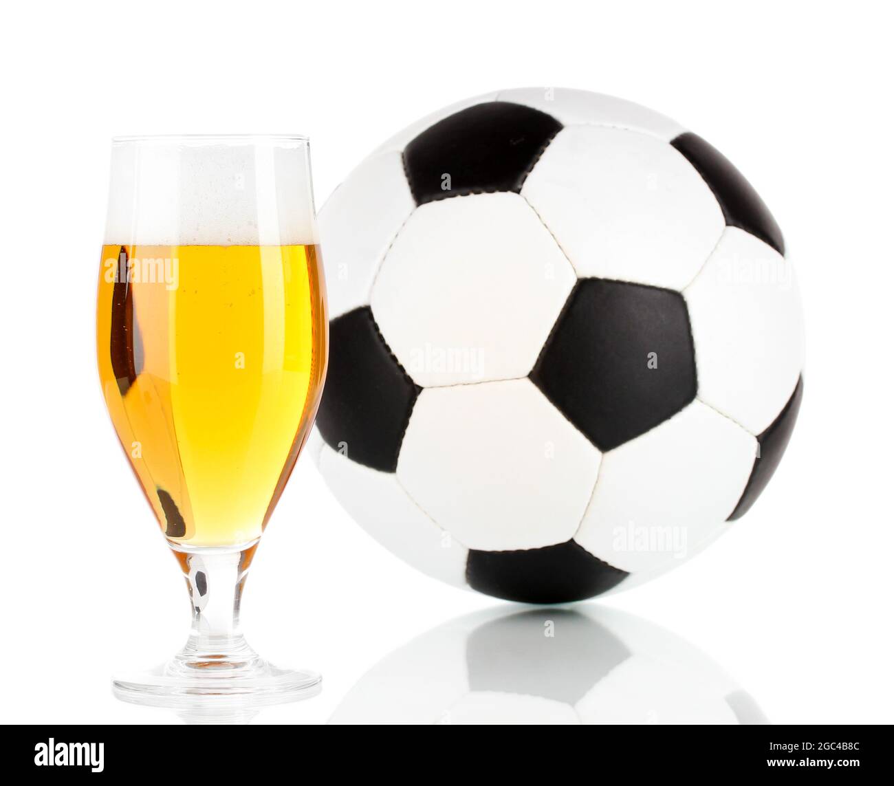Glass of beer with ball isolated on white Stock Photo - Alamy