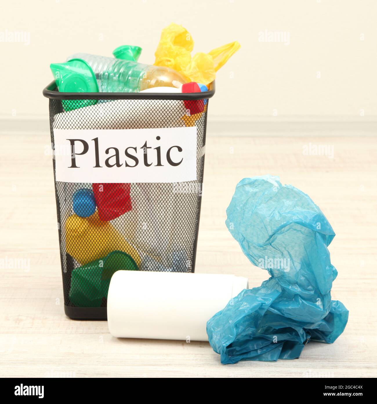 Bucket for waste sorting on room background Stock Photo - Alamy