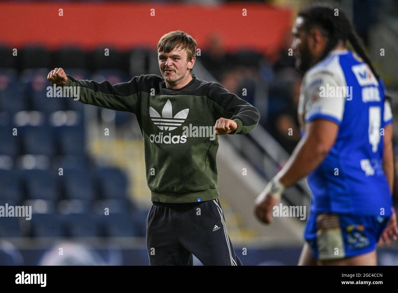 A pitch invader runs on to the pitch during the game Stock Photo - Alamy
