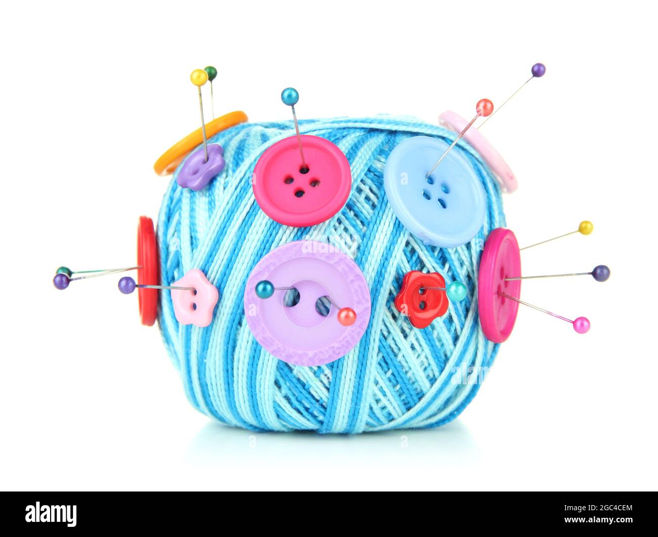 Colorful buttons and wool balls, isolated on white Stock Photo - Alamy