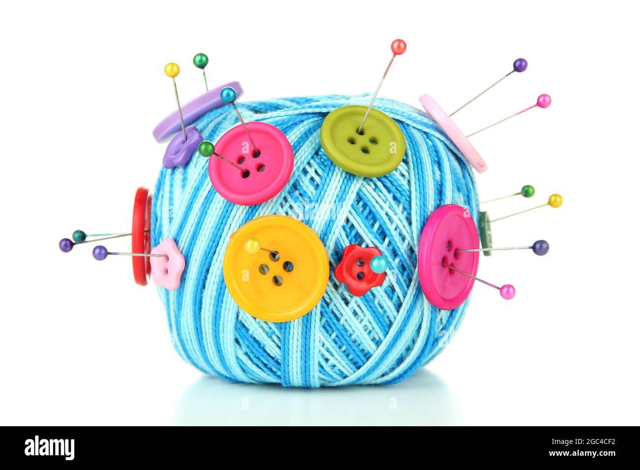 Colorful buttons and wool balls, isolated on white Stock Photo - Alamy