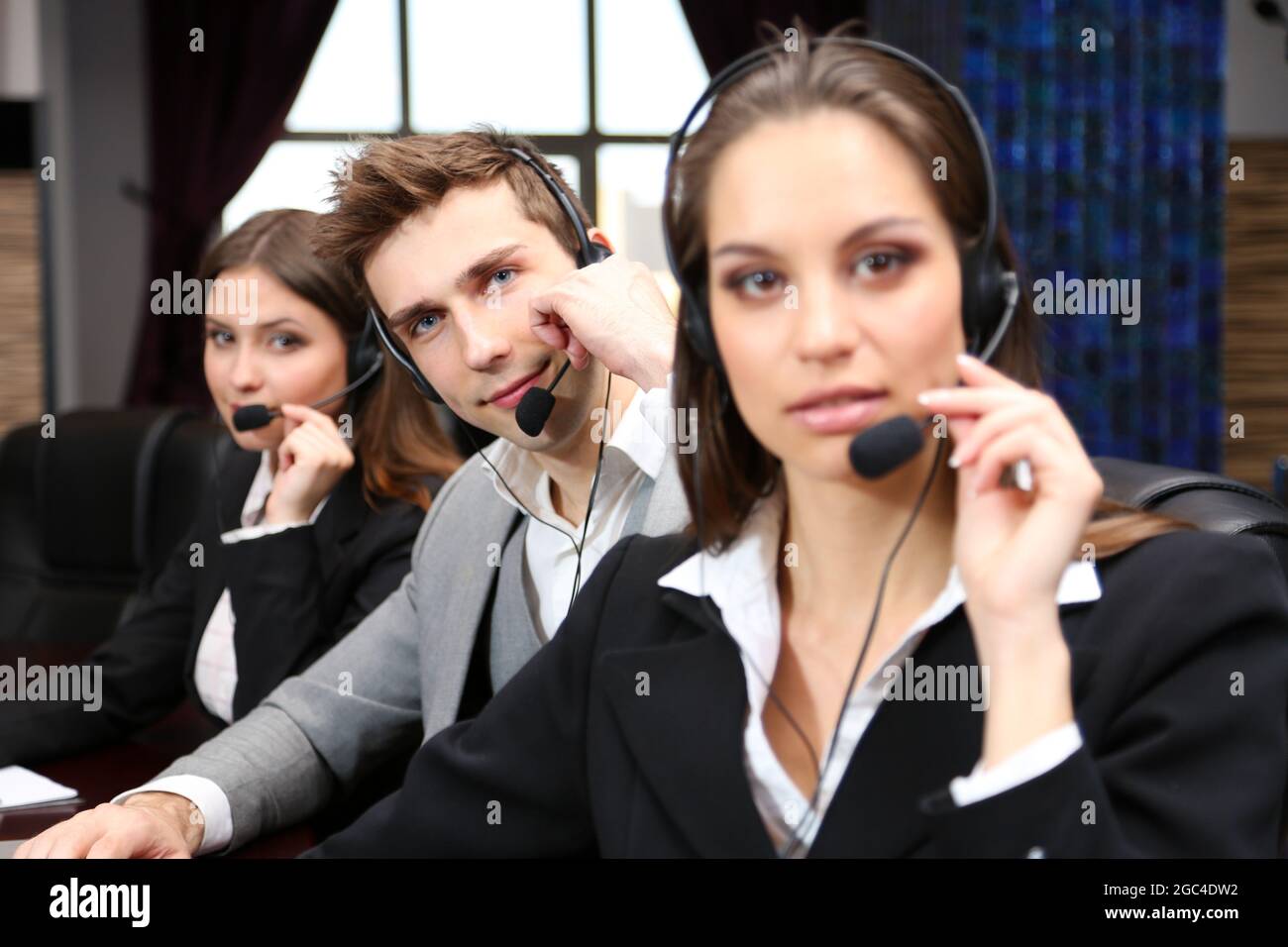 Call center operators at work Stock Photo - Alamy