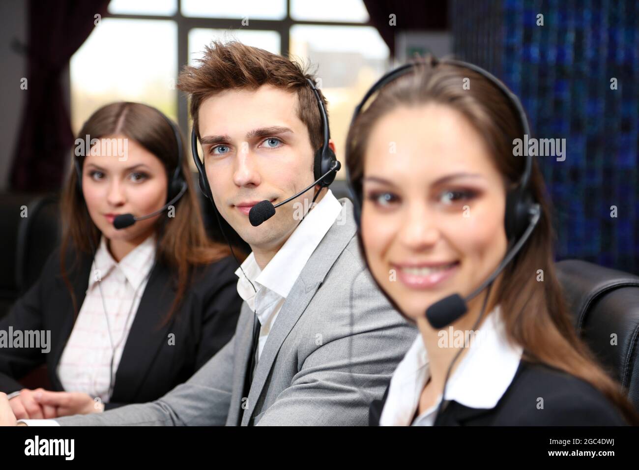 Call center operators at work Stock Photo - Alamy