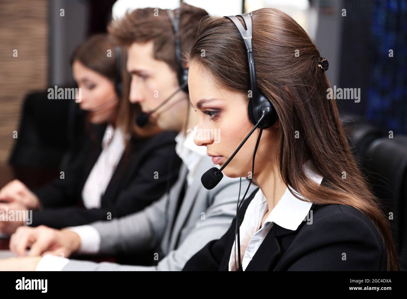 Call center operators at work Stock Photo - Alamy