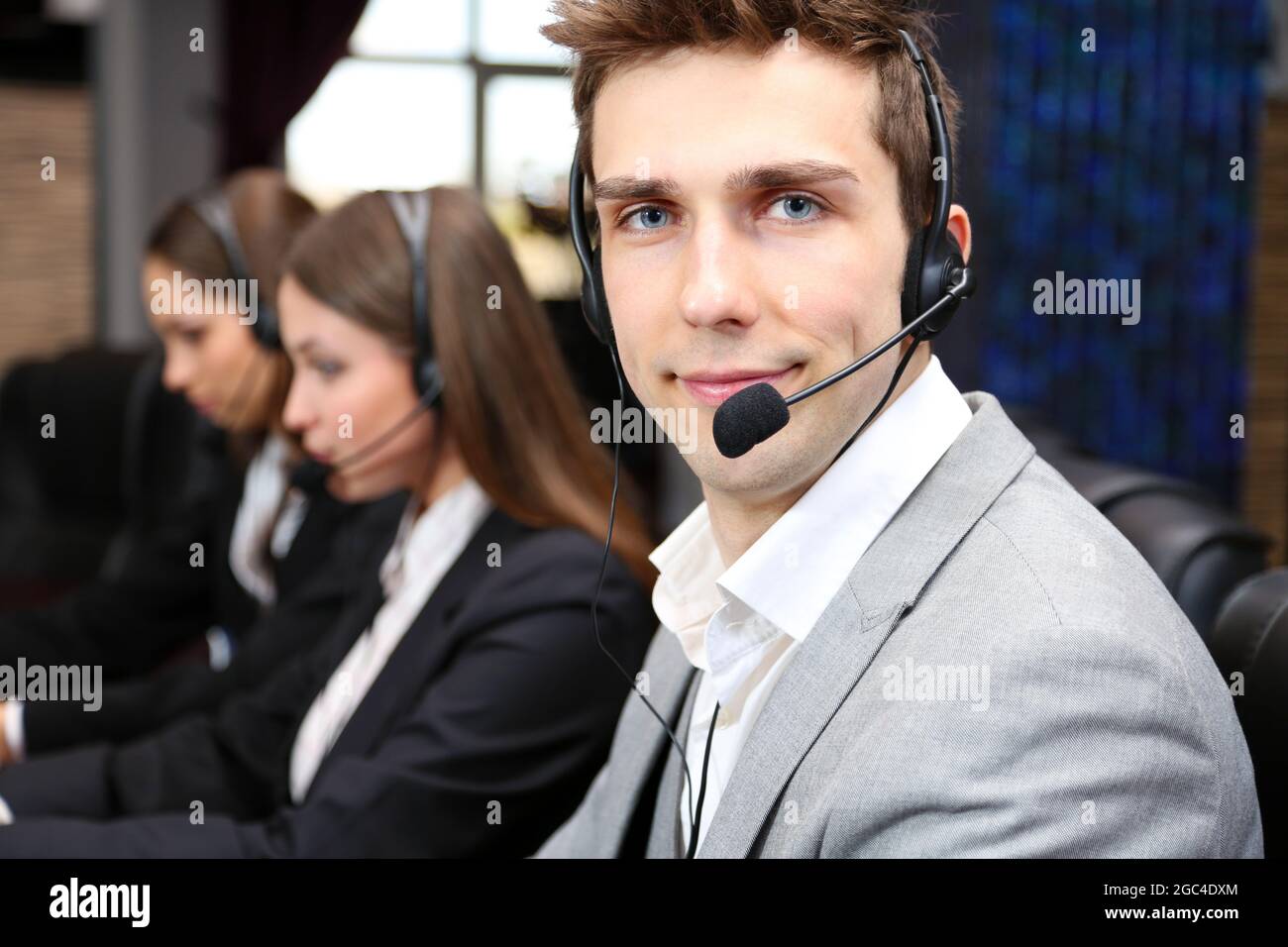 Call center operators at work Stock Photo - Alamy