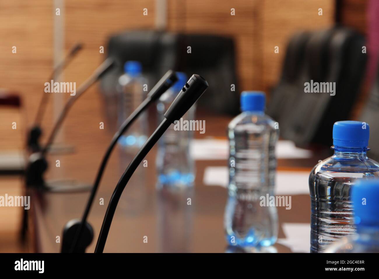 Table in meeting room close-up Stock Photo - Alamy