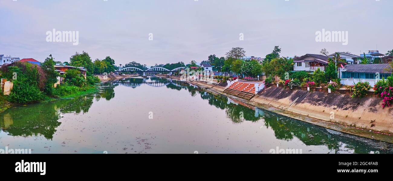 Panorama of the Wang River with clear surface, reflecting the banks ...