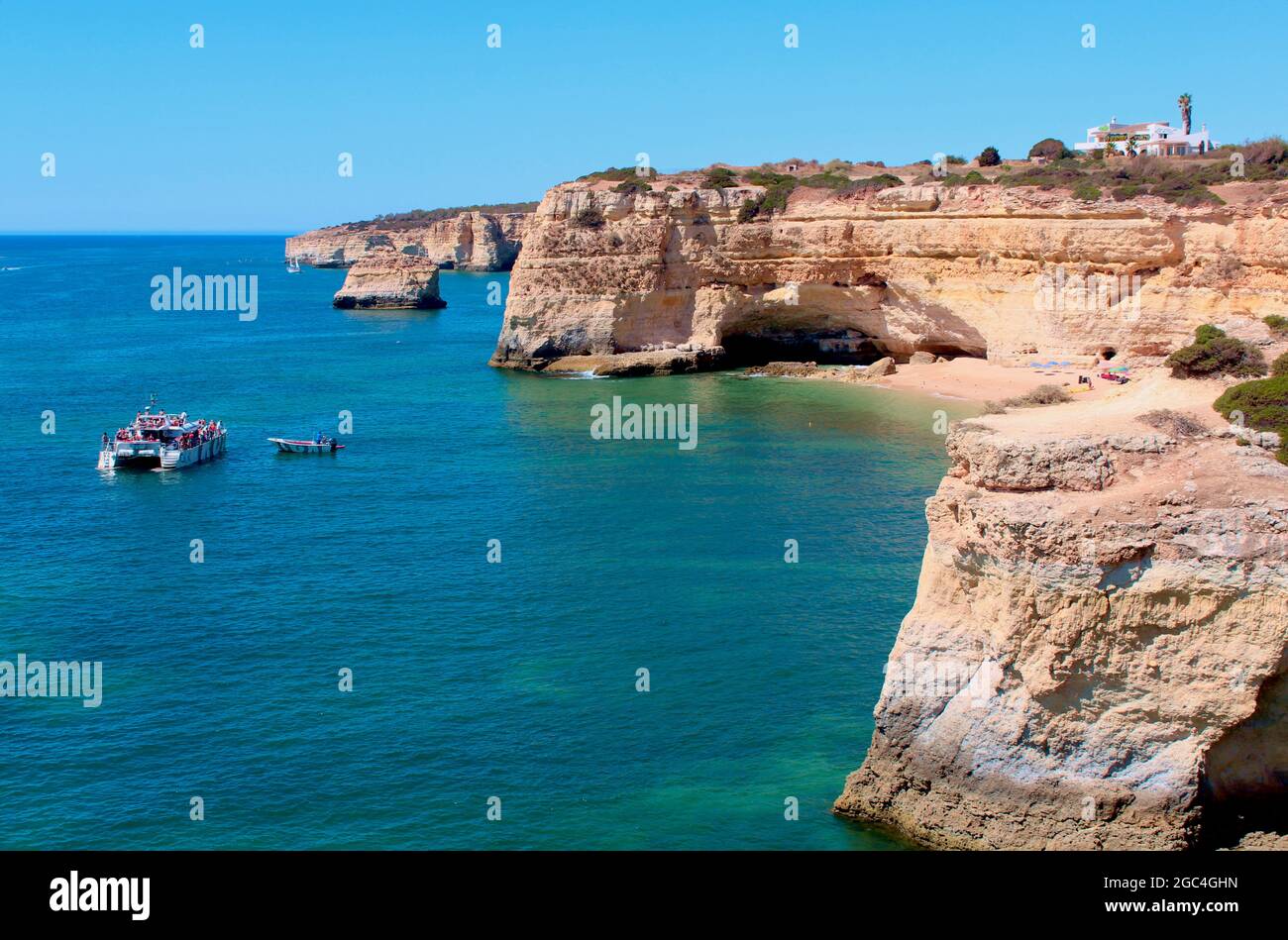 Cliffs, rocks, and beaches in the sunny Algarve coast in southern ...