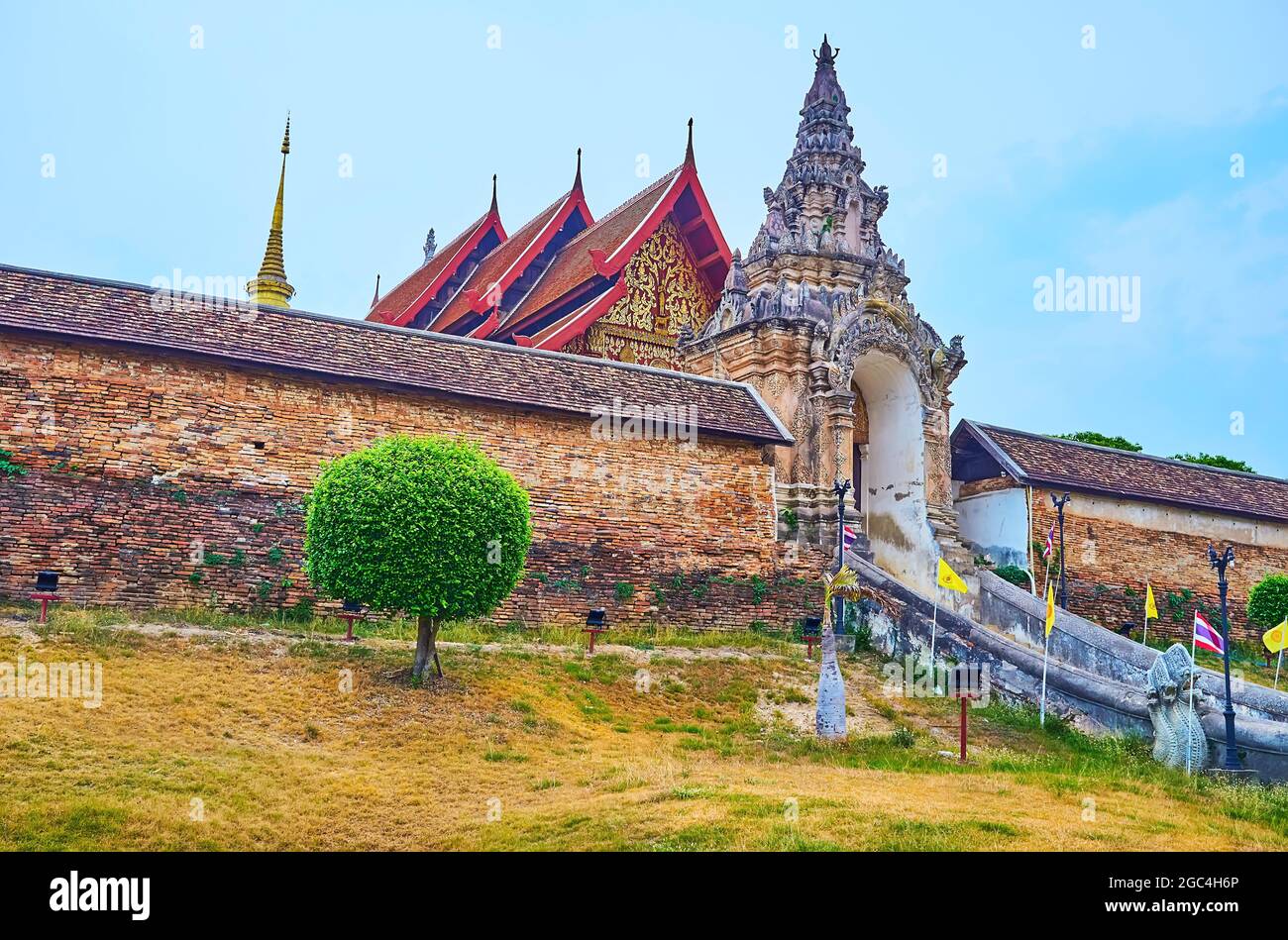 The facade of fortified Wat Phra That Lampang Luang Temple with ...