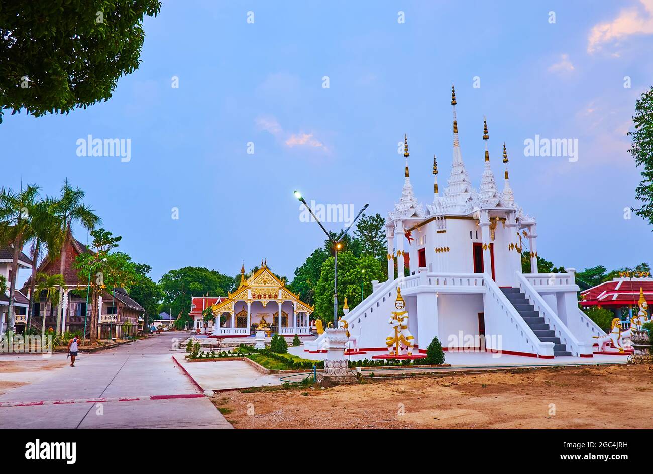The picturesque white shrine, topped with ornate mini stupas, Wat Koh ...