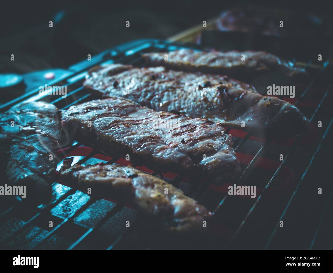 Barbecue mate effect with smoke and cyan tone Stock Photo - Alamy