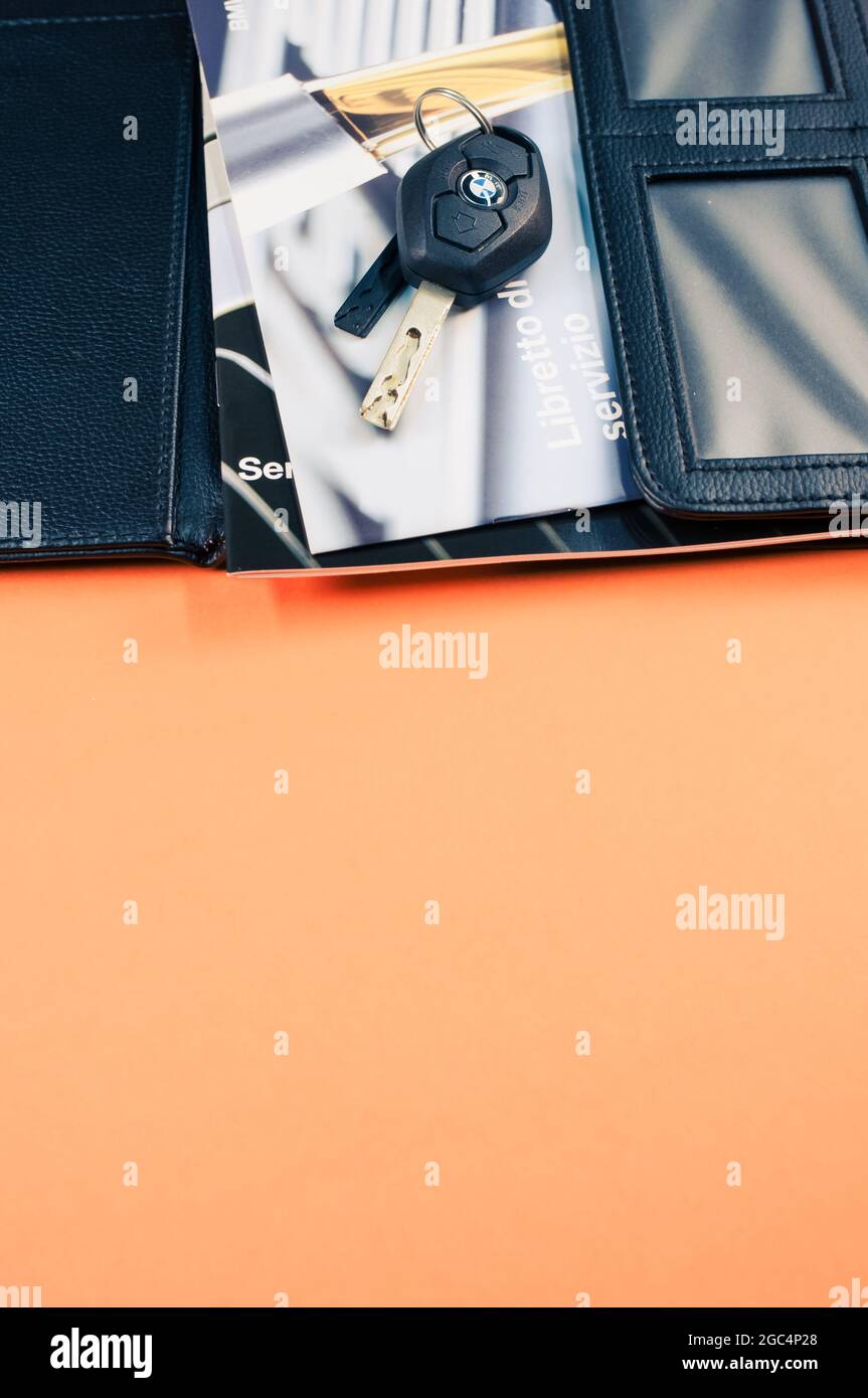 COMO, ITALY - Jul 30, 2021: A close up of BMW car service book with car ...