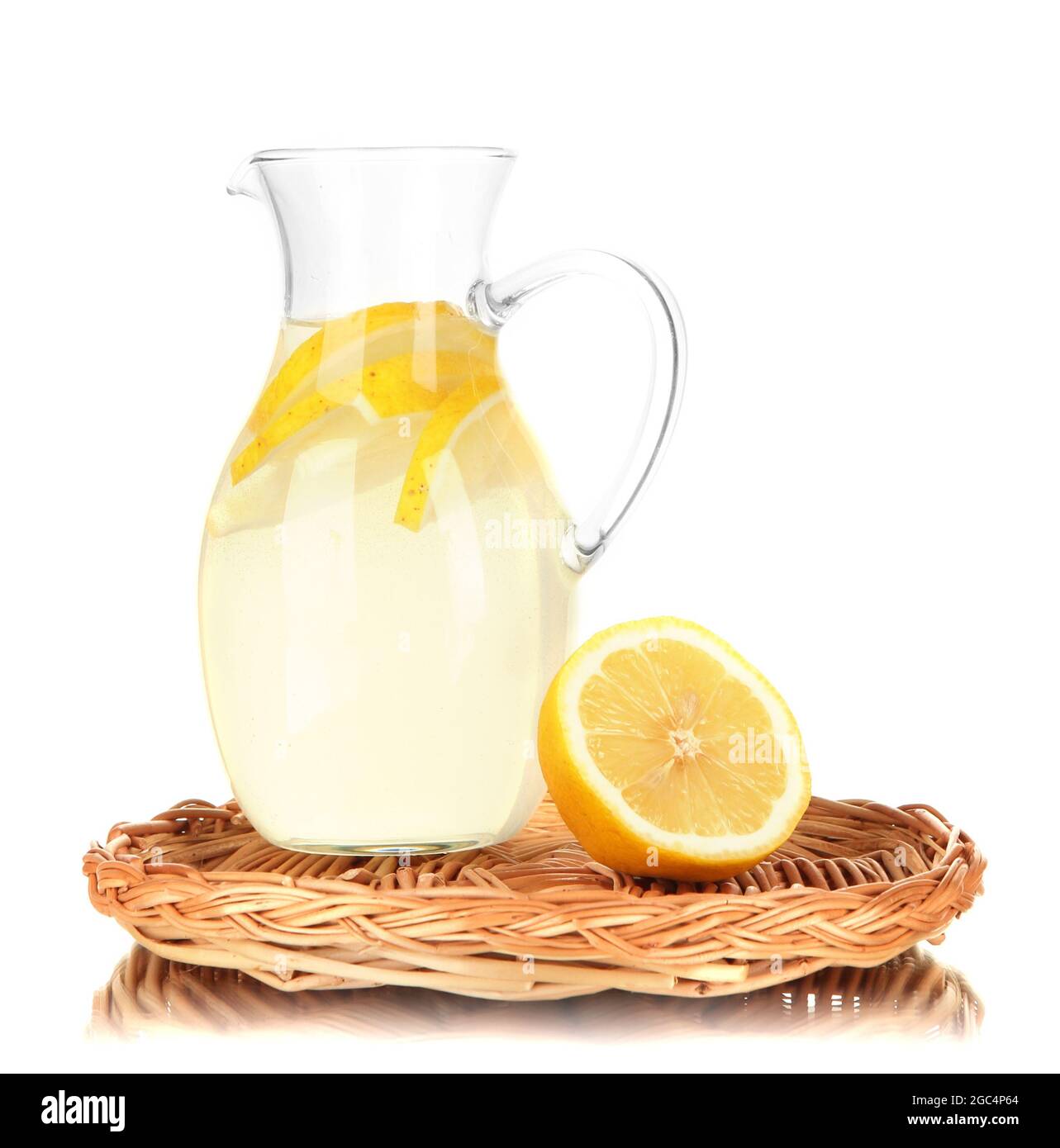Lemonade in pitcher isolated on white Stock Photo - Alamy
