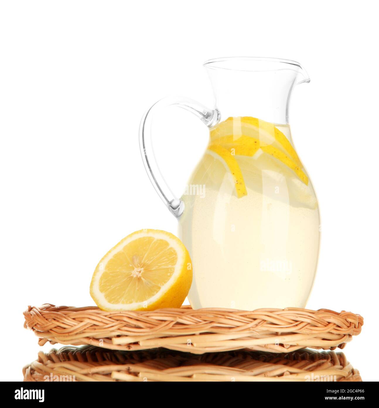 Lemonade in pitcher isolated on white Stock Photo - Alamy