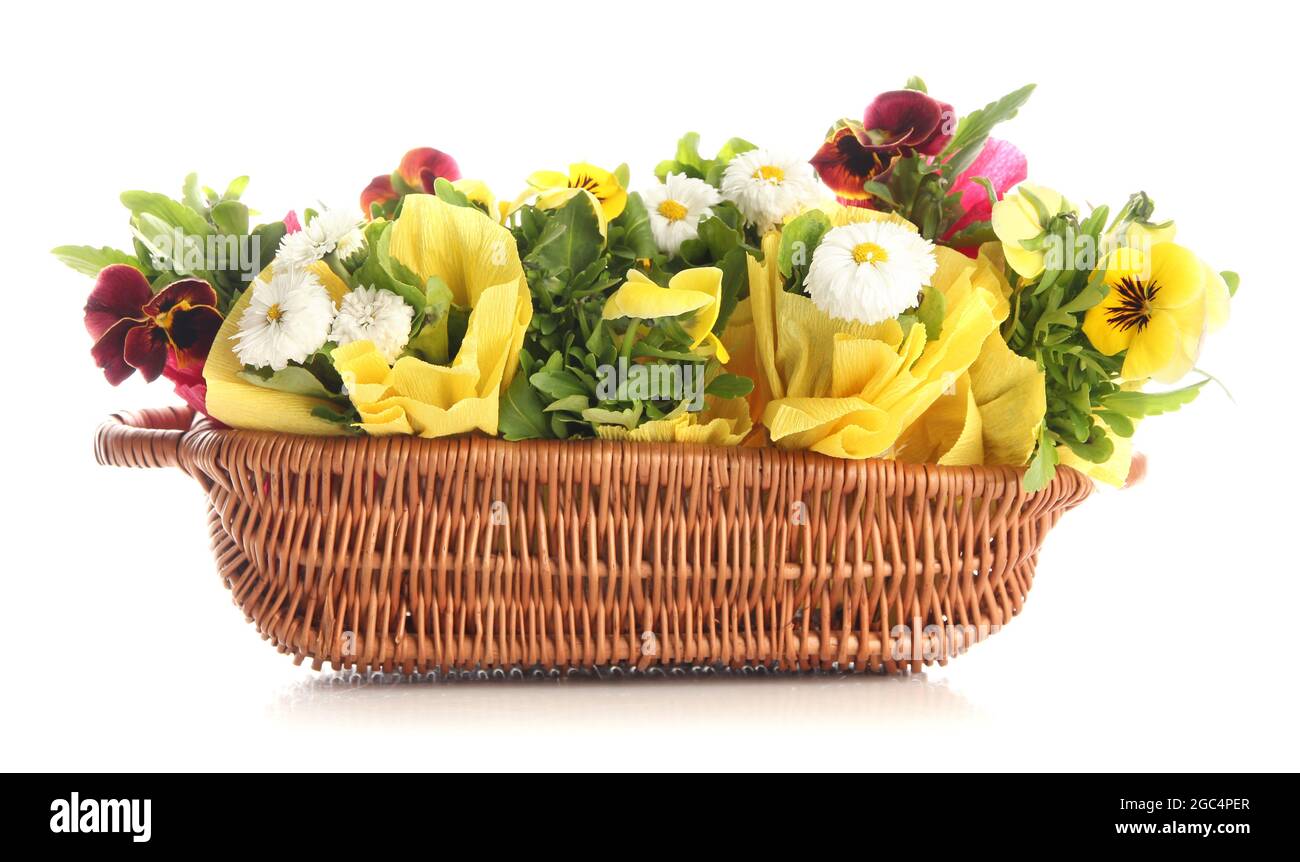 Beautiful spring flowers in basket isolated on white Stock Photo - Alamy