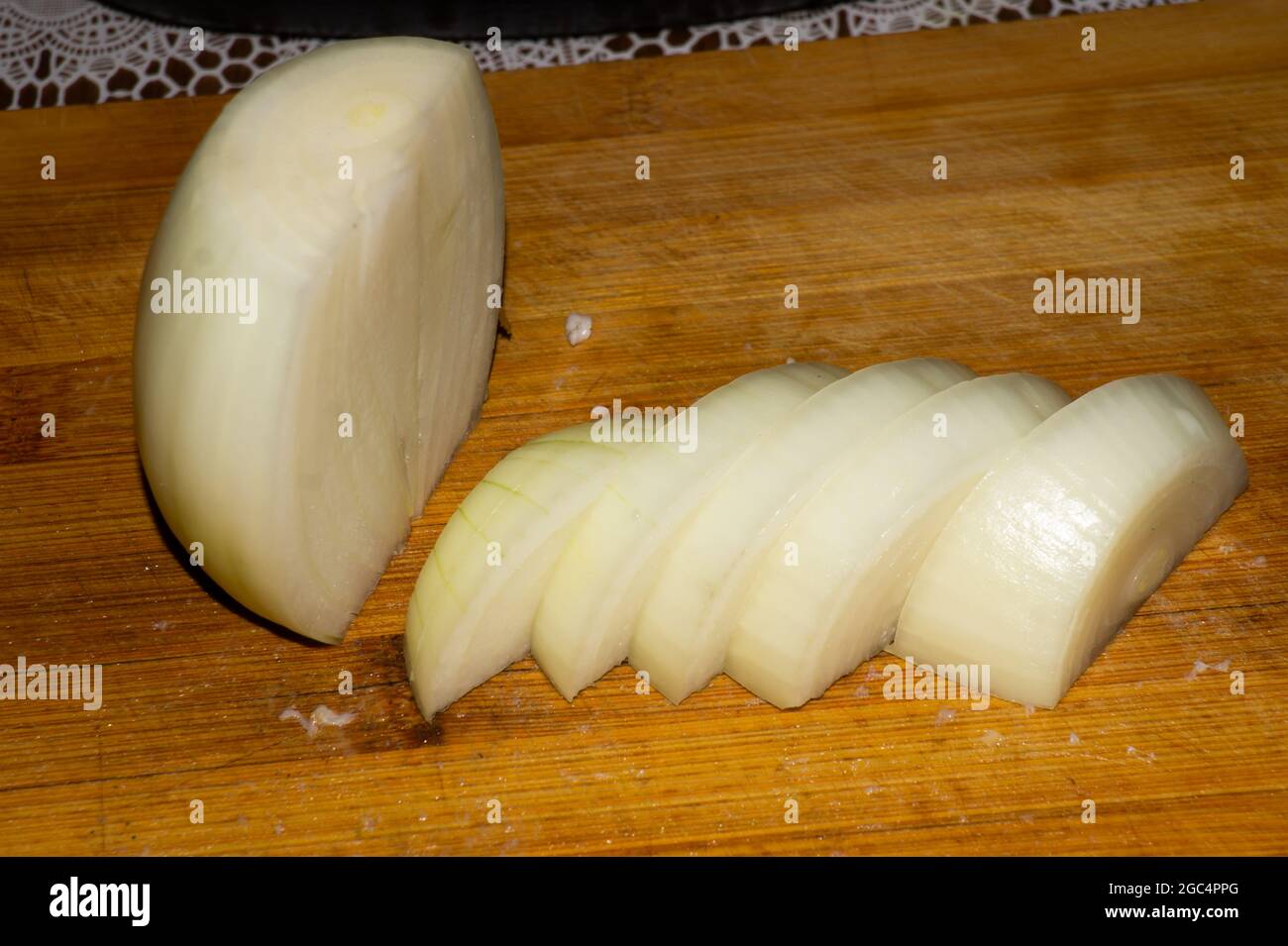 Closeup shot of sliced onion on a cutting board Stock Photo - Alamy