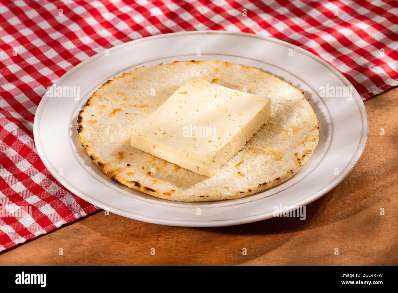 White arepa with cheese - Traditional colombian food Stock Photo - Alamy