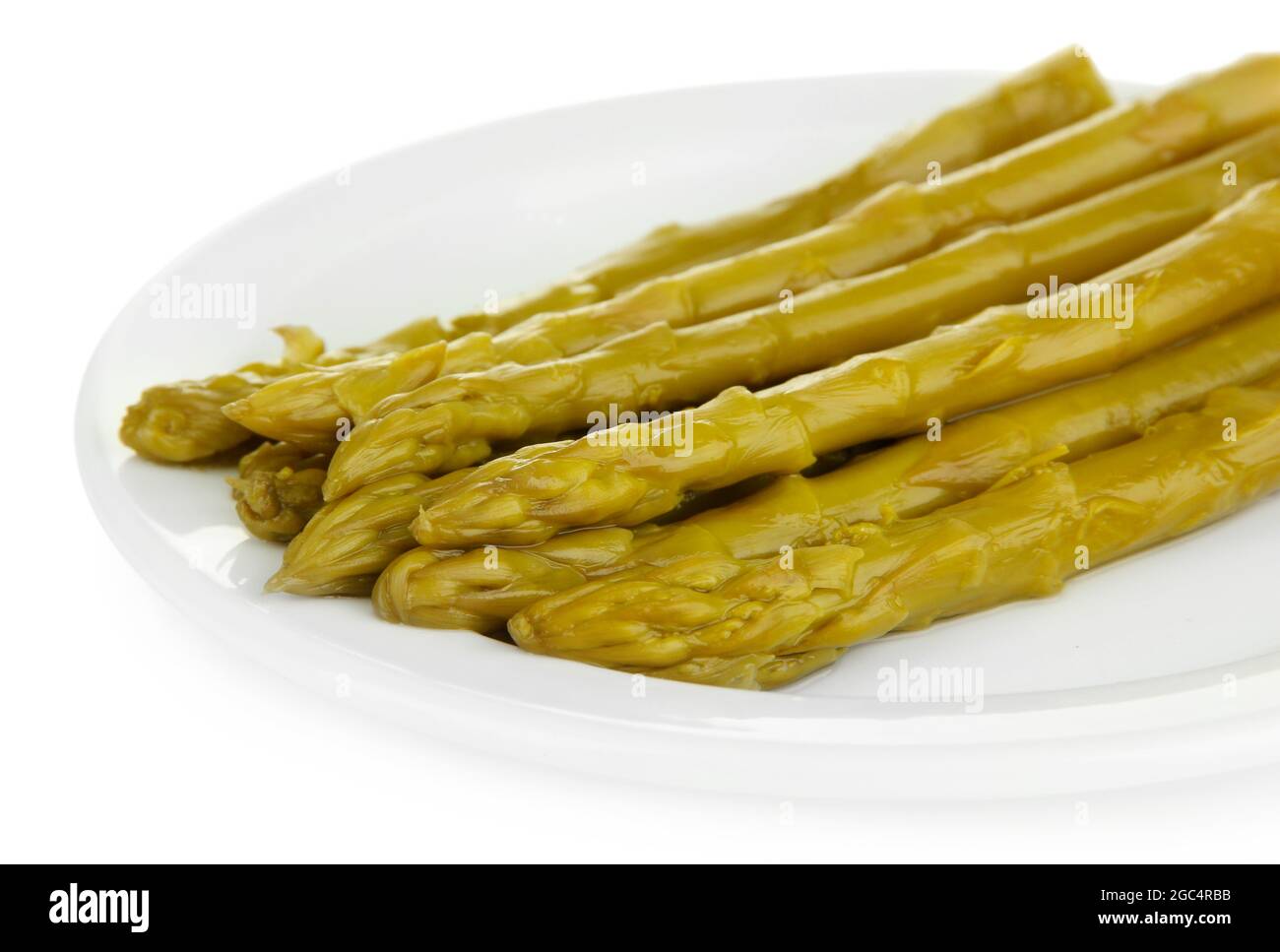 Asparagus on plate, isolated on white Stock Photo - Alamy
