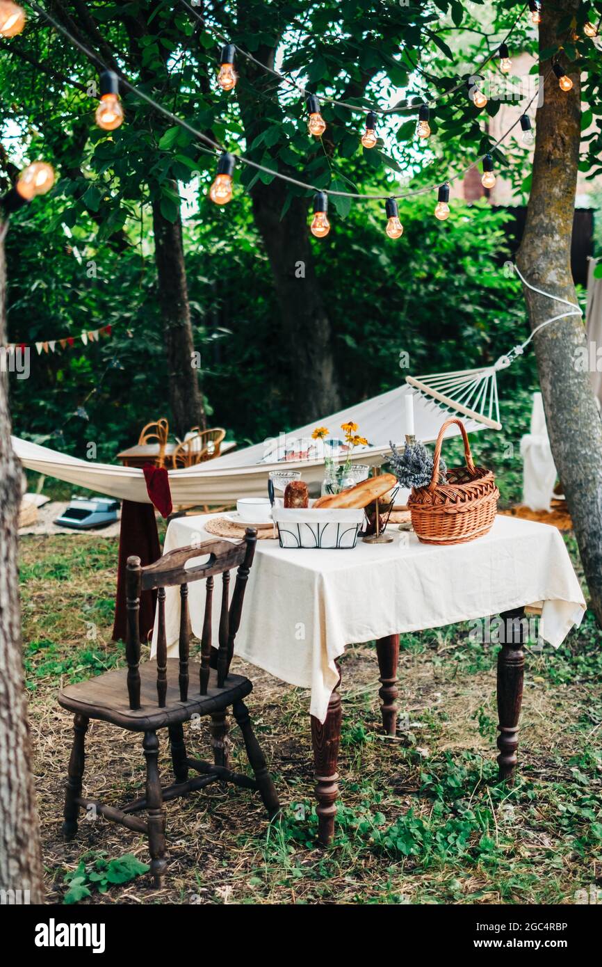 Dinner table in the backyard outdoors in countryside, nobody Stock ...