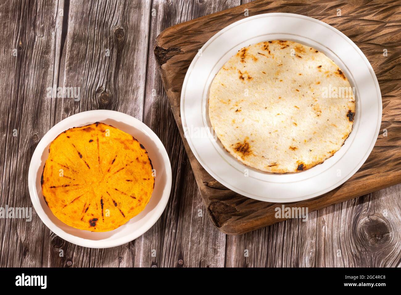 Arepa of ground corn - Traditional Colombian food Stock Photo - Alamy