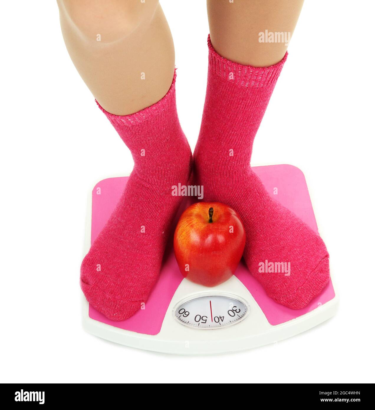 Weighing scales diet feet woman Cut Out Stock Images & Pictures - Alamy