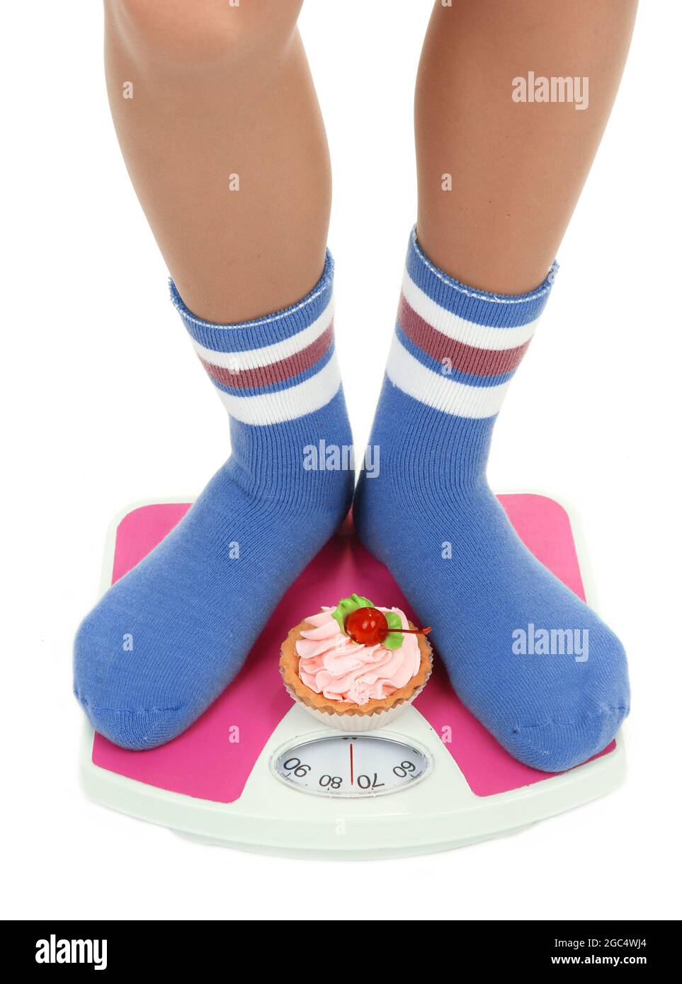 Weighing scales diet feet woman Cut Out Stock Images & Pictures - Alamy