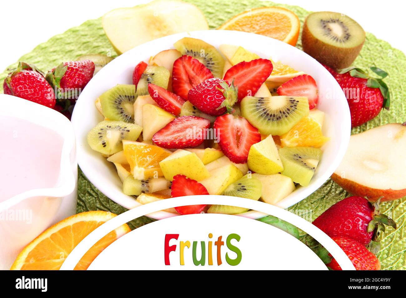 Useful fruit salad of fresh fruits and berries in bowl close-up Stock ...