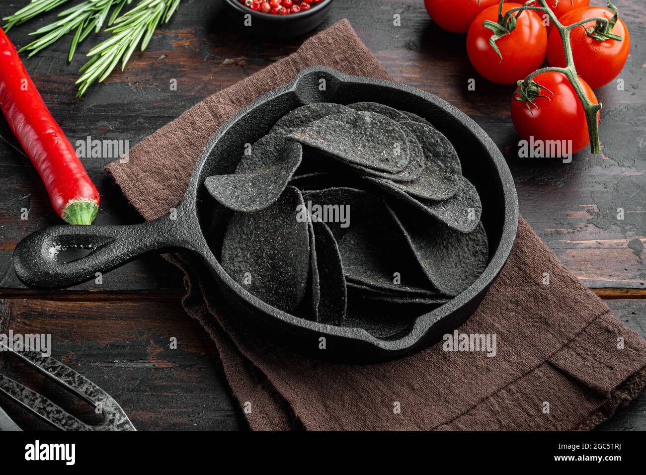 Cheese and chive potato crisp snack set, on old dark wooden table Stock ...