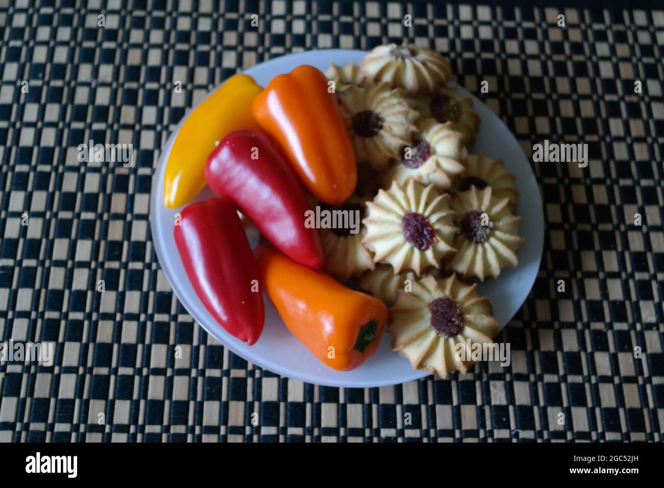 Top view of yummy Qurabiya cookies with bell peppers Stock Photo - Alamy