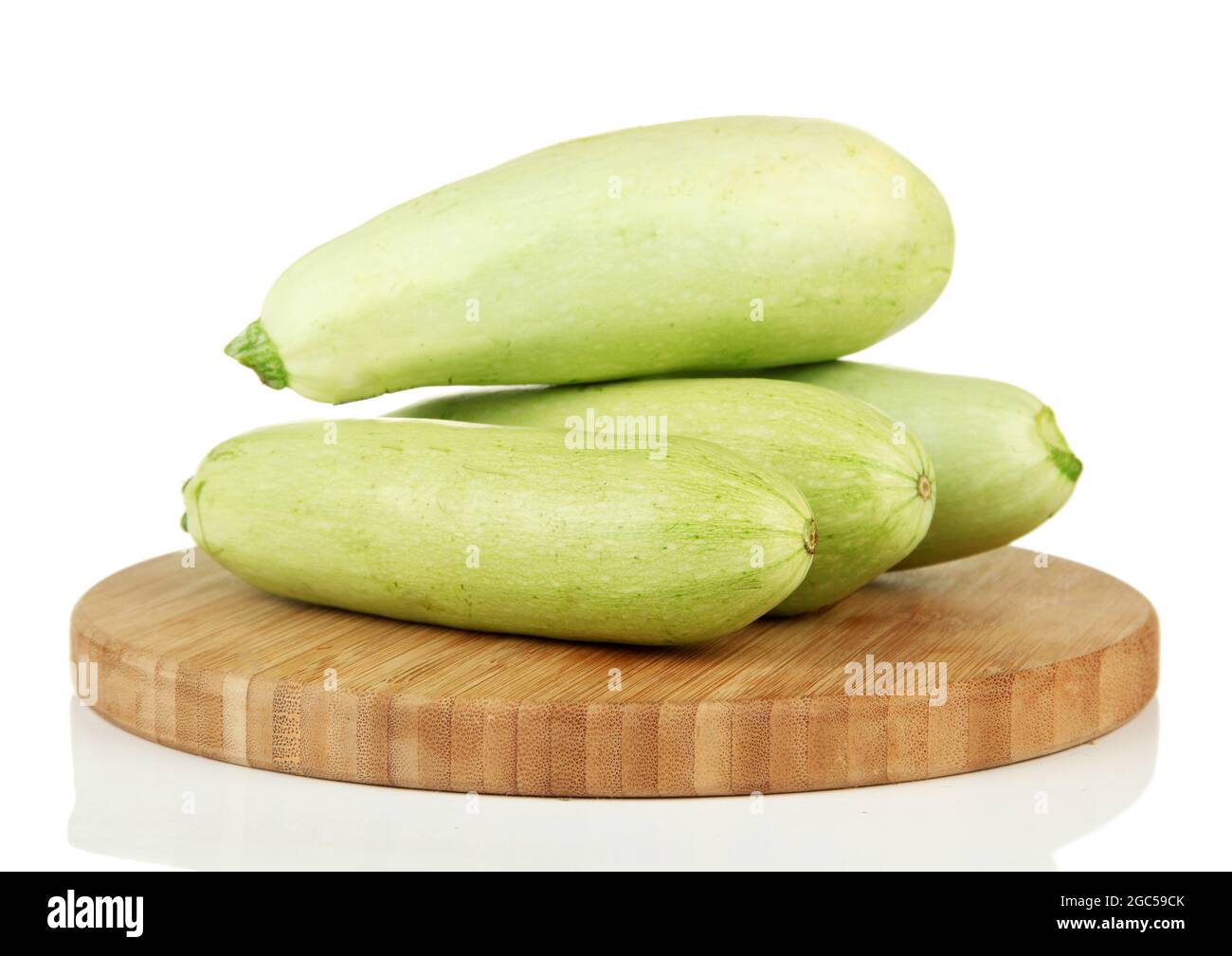 Fresh marrows on cutting board, isolated on white Stock Photo - Alamy
