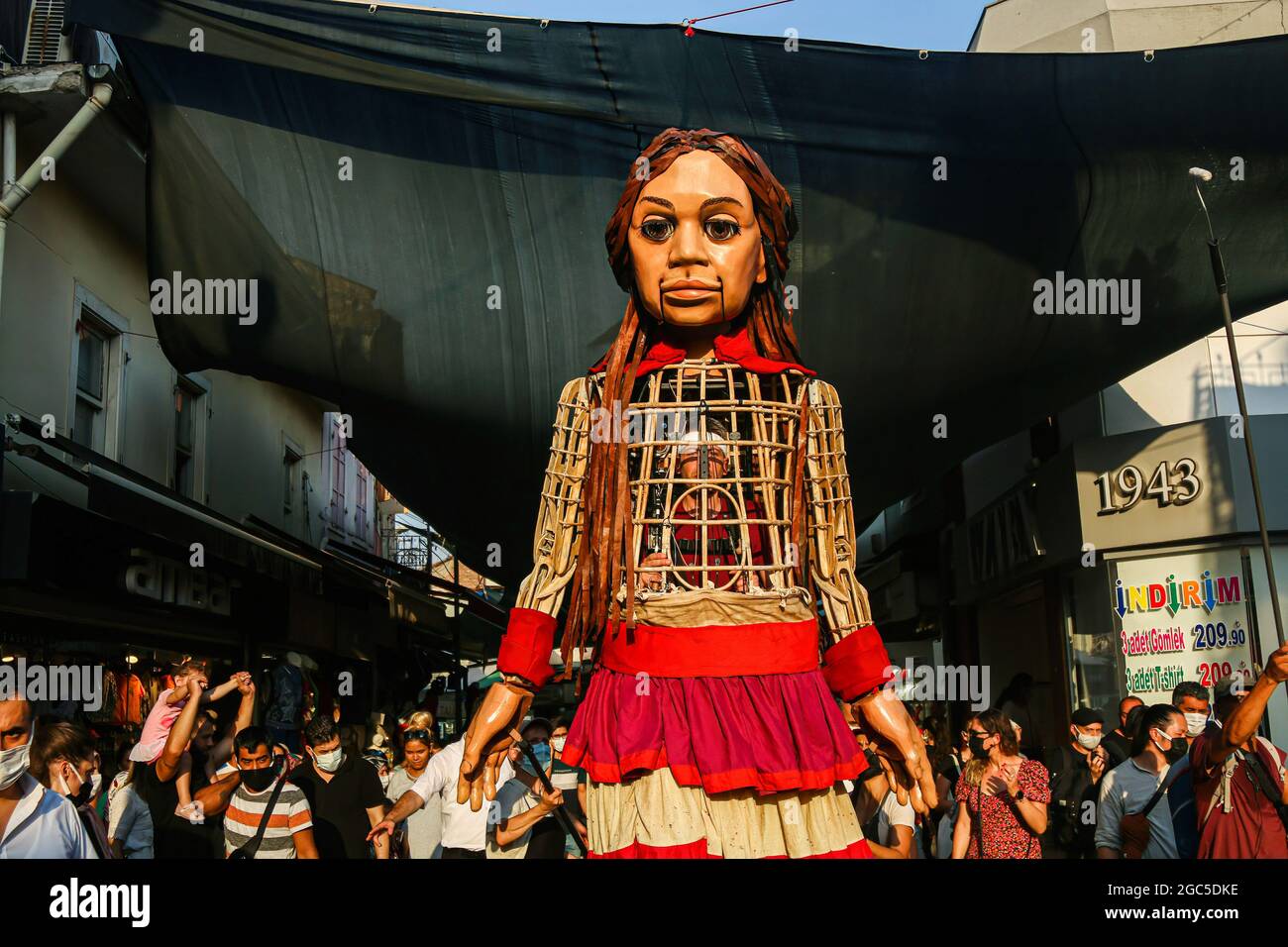Izmir, Turkey. 06th Aug, 2021. A giant puppet "Amal" is seen during the ...