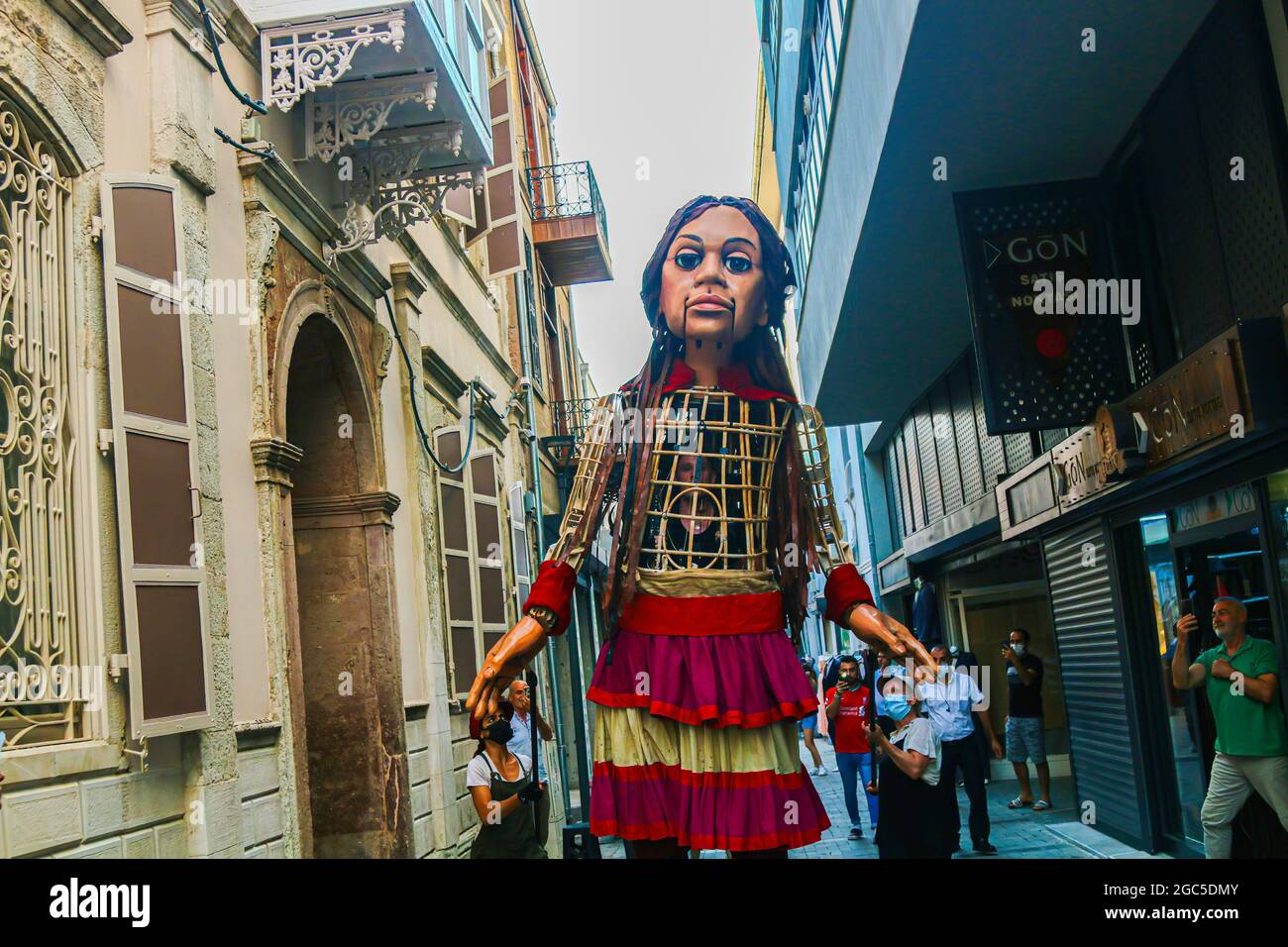 Izmir, Turkey. 06th Aug, 2021. A giant puppet "Amal" is seen during the ...