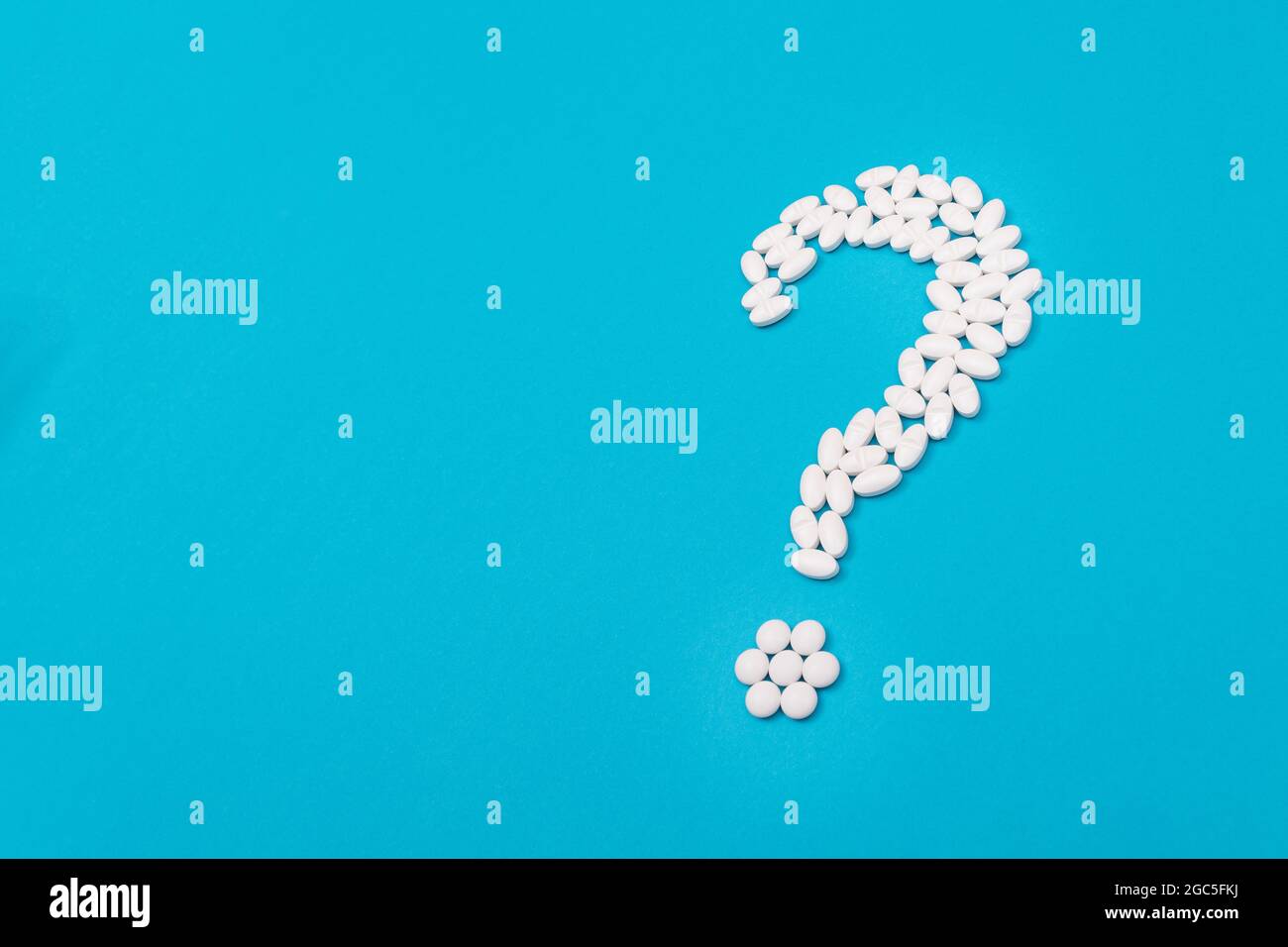 Question Mark Made from White Pills and Tablets, Lying on Blue ...