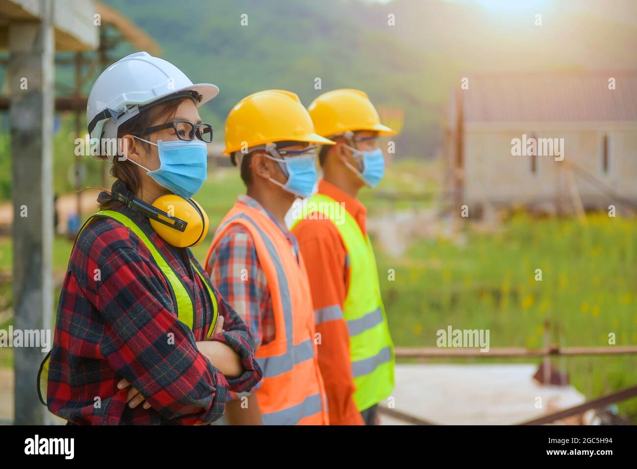 Corona or Covid-19 wear masks during the design of construction. New ...